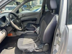 Grey Mitsubishi l-200 2006 in Kaunas, with an engine capacity of 2.50 L and mileage of 91 thousand km for 8500 €, photo 7 on AUTOMOTO.COM.LV