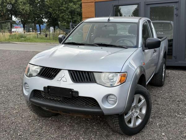 Pelēks Mitsubishi l-200 2006 Kauņa, ar dzinēja tilpumu 2.50 L un nobraukumu 92 tūkst. km par 7500 €, foto 1 vietnē AUTOMOTO.COM.LV