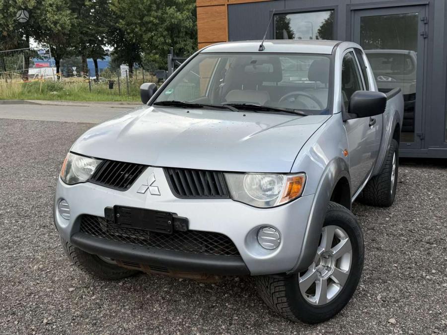 Серый Мицубиси Л 200 2006 в Каунас, объемом двигателя 2.50 л и пробегом 92 тыс. км за 7500 €, фото 1 на AUTOMOTO.COM.LV