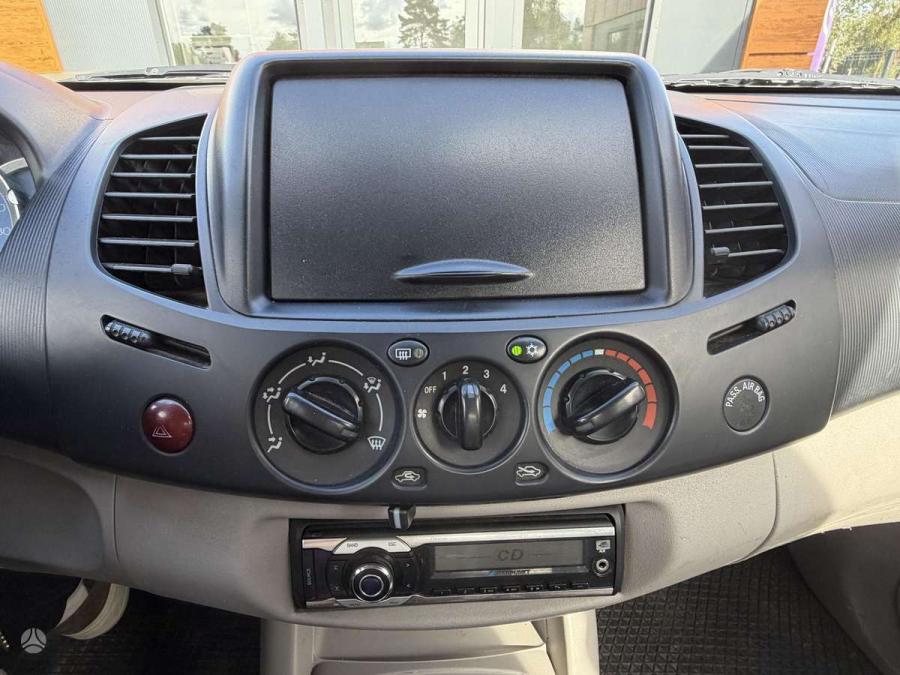 Pelēks Mitsubishi l-200 2006 Kauņa, ar dzinēja tilpumu 2.50 L un nobraukumu 92 tūkst. km par 7500 €, foto 32 vietnē AUTOMOTO.COM.LV