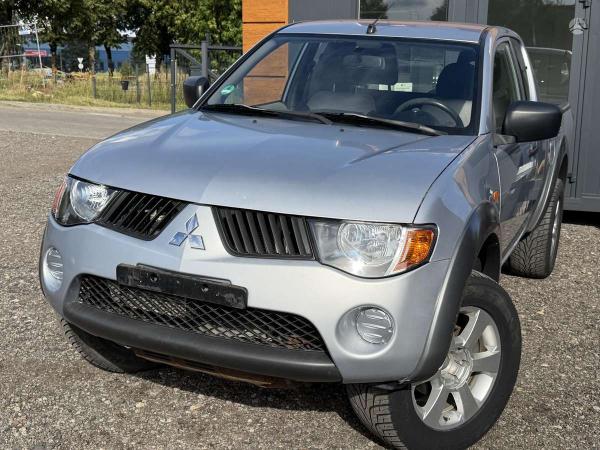 Pelēks Mitsubishi l-200 2006 Kauņa, ar dzinēja tilpumu 2.50 L un nobraukumu 92 tūkst. km par 7500 €, foto 1 vietnē AUTOMOTO.COM.LV