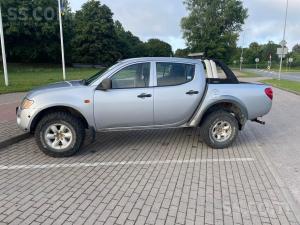 Grey Mitsubishi l-200 2007 in Liepaja, with an engine capacity of 2.40 L and mileage of 296 thousand km for 7000 €, photo 3 on AUTOMOTO.COM.LV