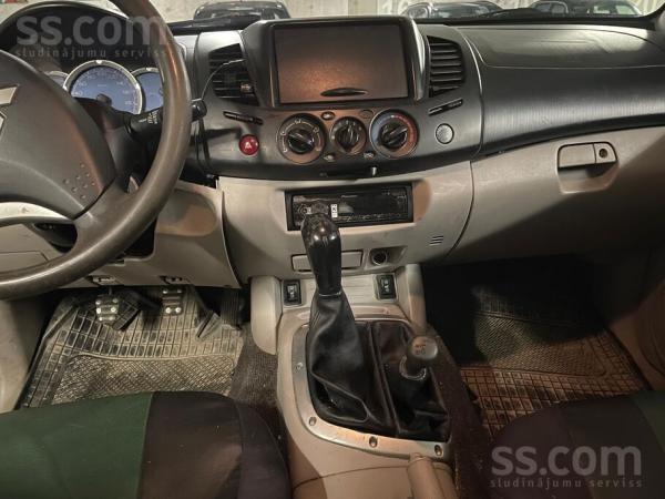 Grey Mitsubishi l-200 2007 in Liepaja, with an engine capacity of 2.40 L and mileage of 296 thousand km for 7000 €, photo 7 on AUTOMOTO.COM.LV