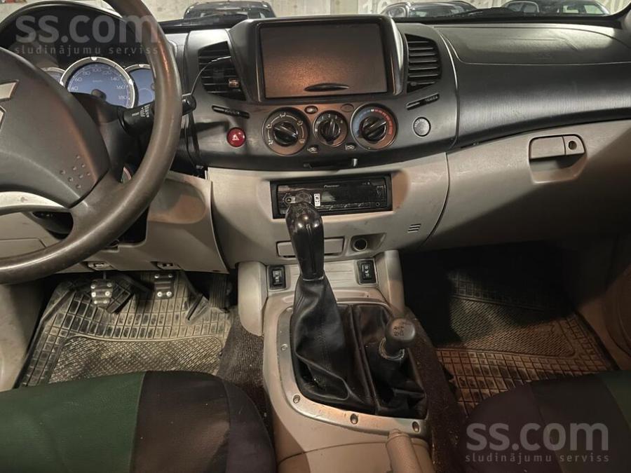 Grey Mitsubishi l-200 2007 in Liepaja, with an engine capacity of 2.40 L and mileage of 296 thousand km for 7000 €, photo 7 on AUTOMOTO.COM.LV