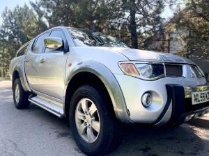 Pelēks Mitsubishi l-200 2007 Šauļi, ar dzinēja tilpumu 2.48 L un nobraukumu 151 tūkst. km par 4850 €, foto 4 vietnē AUTOMOTO.COM.LV