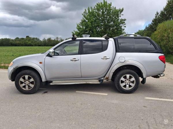 Grey Mitsubishi l-200 2009 in Siauliai, with an engine capacity of 2.48 L and mileage of 191 thousand km for 2700 €, photo 10 on AUTOMOTO.COM.LV