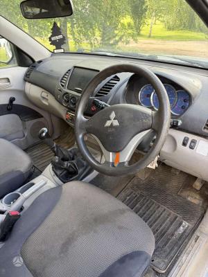 Pelēks Mitsubishi l-200 2010 Raseiniai, ar dzinēja tilpumu 2.48 L un nobraukumu 230 tūkst. km par 3600 €, foto 14 vietnē AUTOMOTO.COM.LV