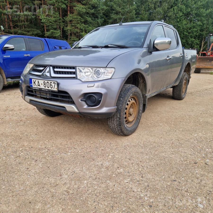 Grey Mitsubishi l-200 2015 in Tukums, with an engine capacity of 2.50 L and mileage of 411 thousand km for 5900 €, photo 1 on AUTOMOTO.COM.LV