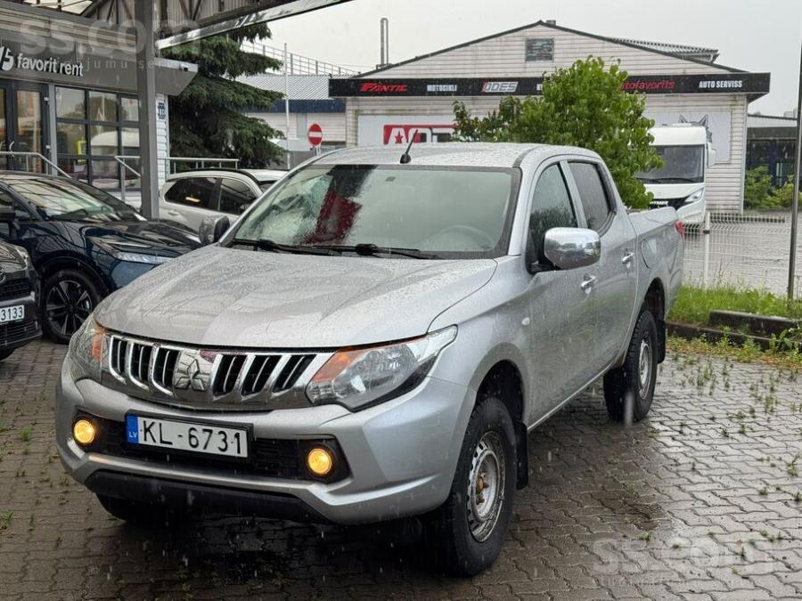 Grey Mitsubishi l-200 2016 in Riga, with an engine capacity of 2.50 L and mileage of 279 thousand km for 10450 €, photo 3 on AUTOMOTO.COM.LV
