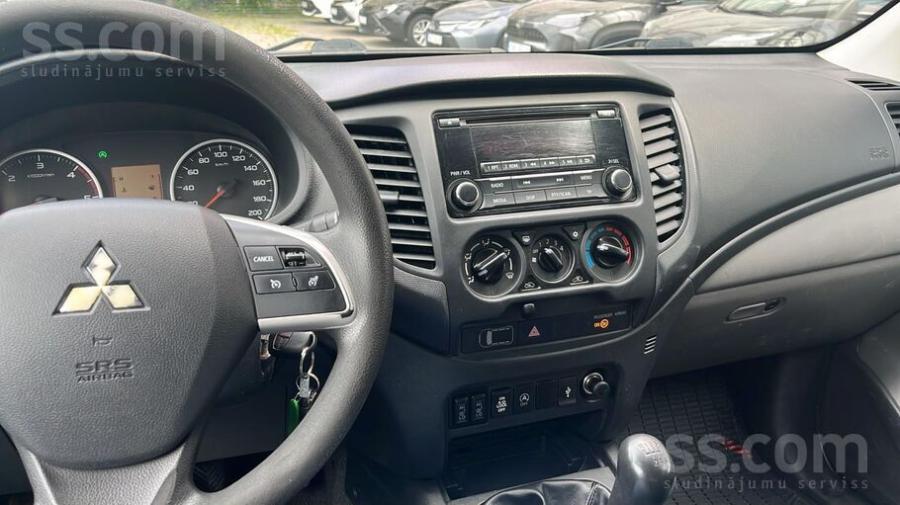 Grey Mitsubishi l-200 2016 in Riga, with an engine capacity of 2.50 L and mileage of 279 thousand km for 10450 €, photo 11 on AUTOMOTO.COM.LV