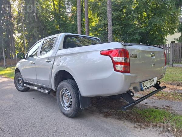 Grey Mitsubishi l-200 2016 in Ogre, with an engine capacity of 2.40 L and mileage of 333 thousand km for 10000 €, photo 3 on AUTOMOTO.COM.LV