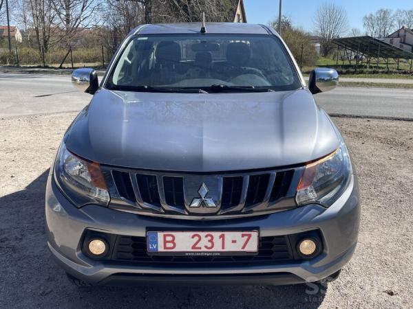 Grey Mitsubishi l-200 2019 in Riga, with an engine capacity of 2.40 L and mileage of 257 thousand km for 14990 €, photo 8 on AUTOMOTO.COM.LV