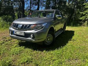 Pelēks Mitsubishi l-200 2019 Rīga, ar dzinēja tilpumu 2.40 L un nobraukumu 0 tūkst. km par 12000 €, foto  vietnē AUTOMOTO.COM.LV