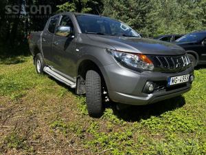 Pelēks Mitsubishi l-200 2019 Rīga, ar dzinēja tilpumu 2.40 L un nobraukumu 0 tūkst. km par 12000 €, foto 4 vietnē AUTOMOTO.COM.LV