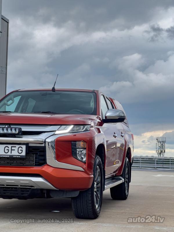 Oranžs Mitsubishi l-200 2022 Tallina, ar dzinēja tilpumu 2.30 L un nobraukumu 130 tūkst. km par 29995 €, foto 2 vietnē AUTOMOTO.COM.LV