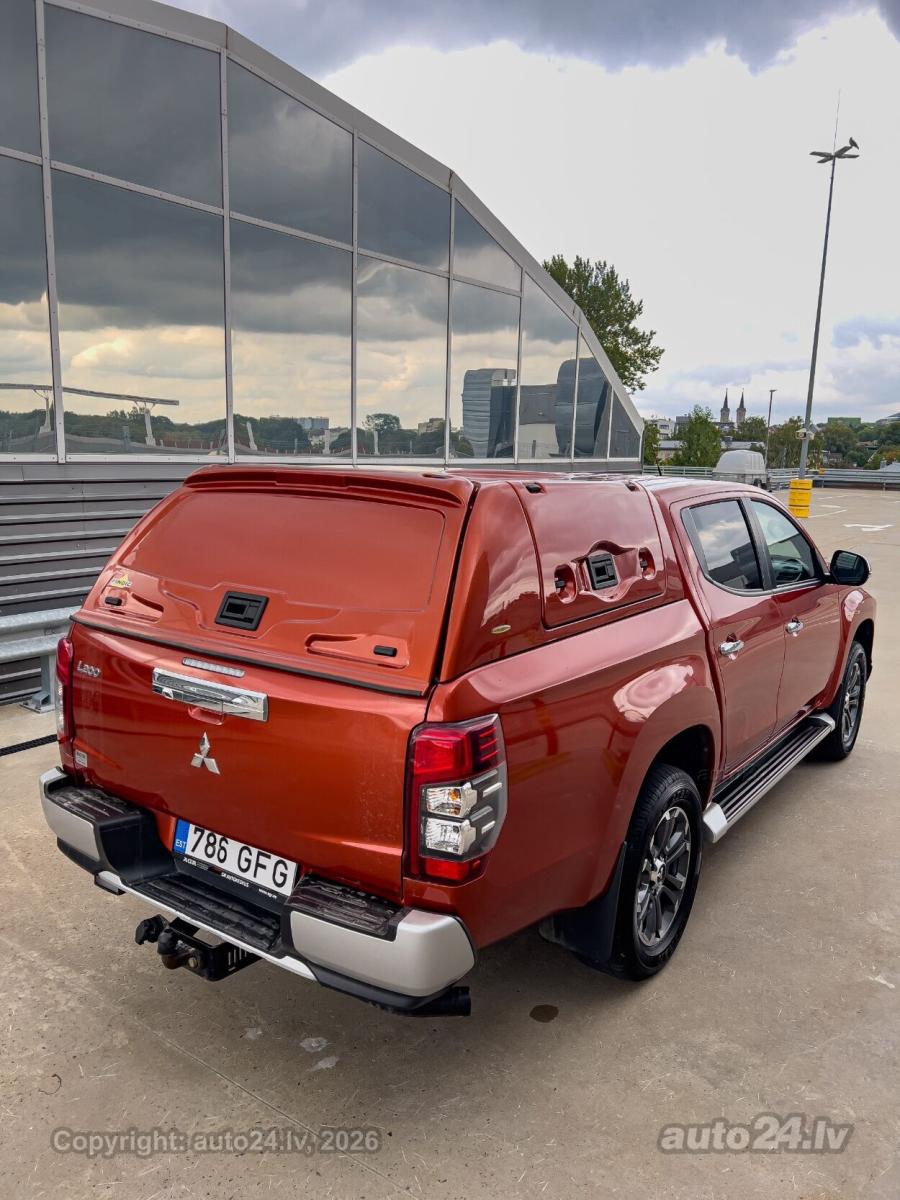 Oranžs Mitsubishi l-200 2022 Tallina, ar dzinēja tilpumu 2.30 L un nobraukumu 130 tūkst. km par 29995 €, foto 6 vietnē AUTOMOTO.COM.LV