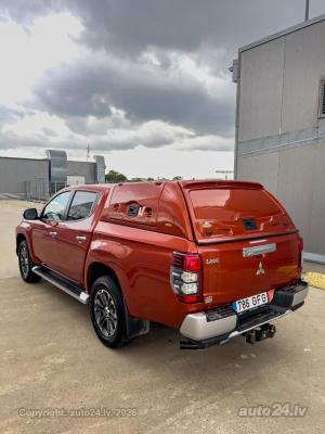 Oranžs Mitsubishi l-200 2022 Tallina, ar dzinēja tilpumu 2.30 L un nobraukumu 130 tūkst. km par 29995 €, foto 7 vietnē AUTOMOTO.COM.LV