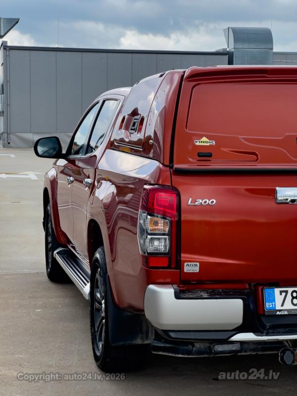 Oranžs Mitsubishi l-200 2022 Tallina, ar dzinēja tilpumu 2.30 L un nobraukumu 130 tūkst. km par 29995 €, foto 7 vietnē AUTOMOTO.COM.LV