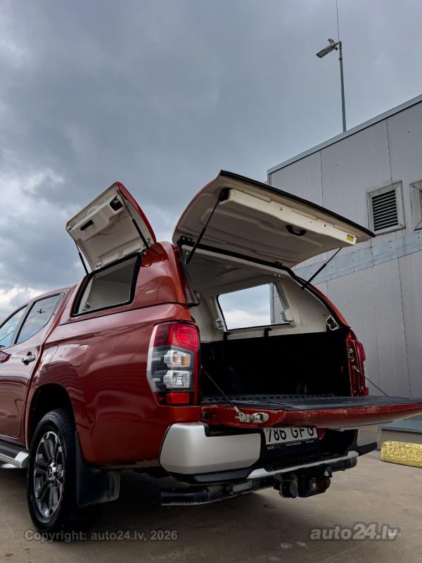 Oranžs Mitsubishi l-200 2022 Tallina, ar dzinēja tilpumu 2.30 L un nobraukumu 130 tūkst. km par 29995 €, foto 8 vietnē AUTOMOTO.COM.LV