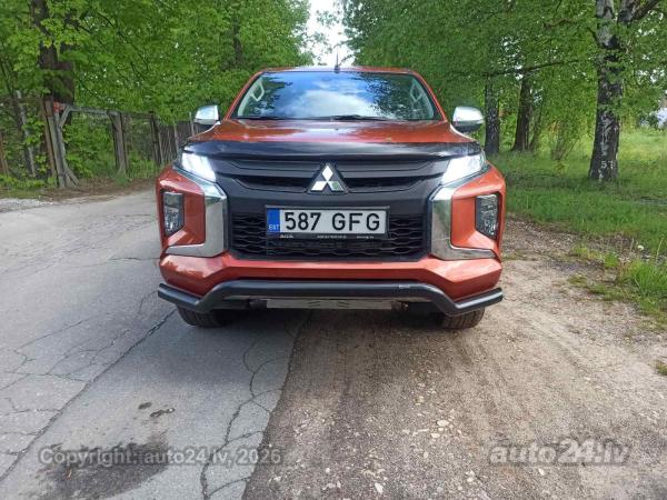 Orange Mitsubishi l-200 2022 in Tallinn, with an engine capacity of 2.30 L and mileage of 50 thousand km for 34900 €, photo 2 on AUTOMOTO.COM.LV