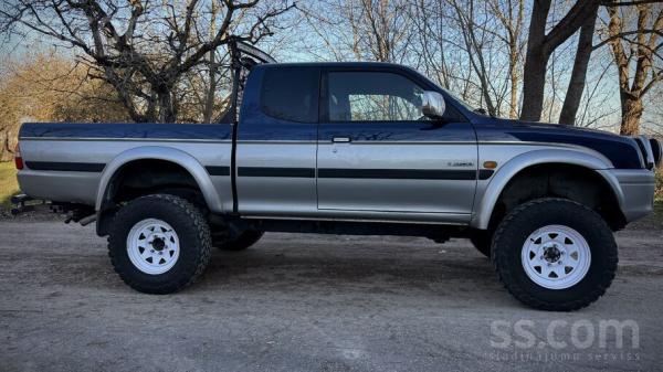 Mitsubishi l-200 2001 Tukums, ar dzinēja tilpumu 2.50 L un nobraukumu 202 tūkst. km par 6700 €, foto 6 vietnē AUTOMOTO.COM.LV