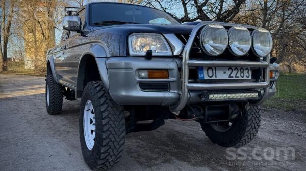 Mitsubishi l-200 2001 Tukums, ar dzinēja tilpumu 2.50 L un nobraukumu 202 tūkst. km par 6700 €, foto 8 vietnē AUTOMOTO.COM.LV
