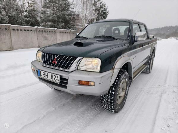 Mitsubishi l-200 2003 Jonava, ar dzinēja tilpumu 2.48 L un nobraukumu 179 tūkst. km par 4500 €, foto 1 vietnē AUTOMOTO.COM.LV