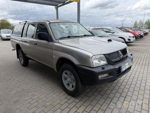 Mitsubishi l-200 2005 Talsi, ar dzinēja tilpumu 2.50 L un nobraukumu 248 tūkst. km par 4970 €, foto 9 vietnē AUTOMOTO.COM.LV