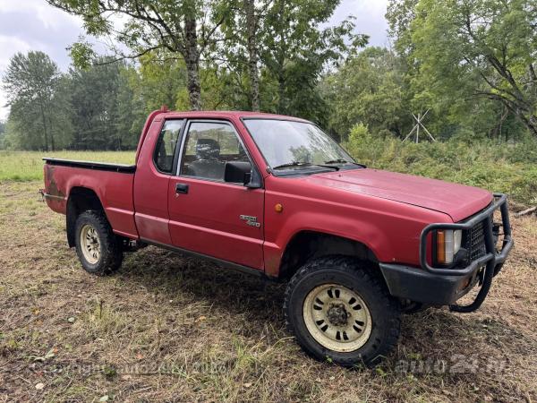 Red Mitsubishi l-200 1990 in Tallinn, with an engine capacity of 2.00 L and mileage of 355 thousand km for 1000 €, photo 3 on AUTOMOTO.COM.LV