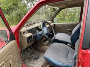 Red Mitsubishi l-200 1990 in Tallinn, with an engine capacity of 2.00 L and mileage of 355 thousand km for 1000 €, photo 7 on AUTOMOTO.COM.LV