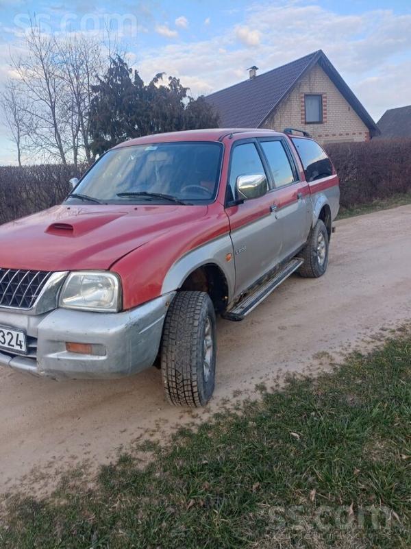 Sarkans Mitsubishi l-200 1998 Tukums, ar dzinēja tilpumu 2.50 L un nobraukumu 408 tūkst. km par 1600 €, foto 1 vietnē AUTOMOTO.COM.LV