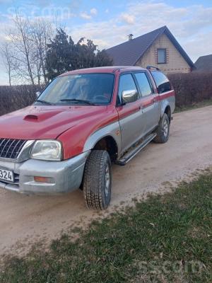 Sarkans Mitsubishi l-200 1998 Tukums, ar dzinēja tilpumu 2.50 L un nobraukumu 408 tūkst. km par 1600 €, foto  vietnē AUTOMOTO.COM.LV