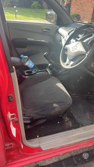 Red Mitsubishi l-200 2013 in Silute, with an engine capacity of 0.00 L and mileage of 137 thousand km for 5000 €, photo 6 on AUTOMOTO.COM.LV
