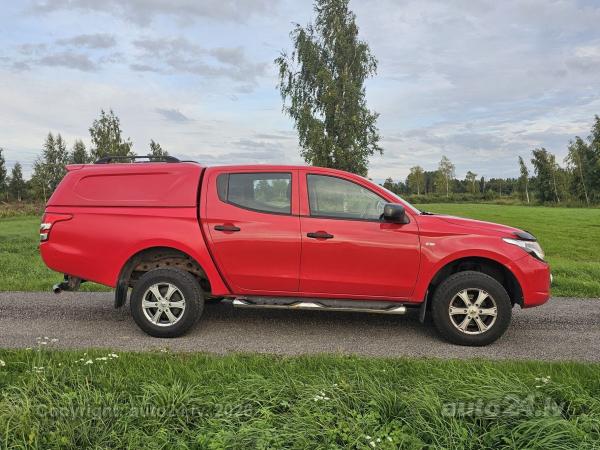 Red Mitsubishi l-200 2017 in Tallinn, with an engine capacity of 2.40 L and mileage of 168 thousand km for 18000 €, photo 3 on AUTOMOTO.COM.LV