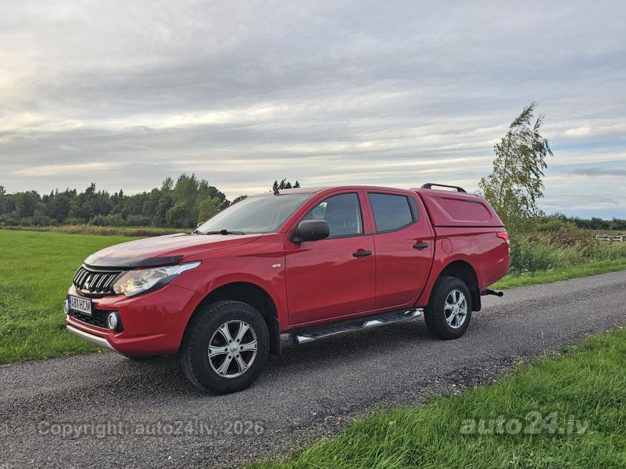 Красный Мицубиси Л 200 2017 в Таллин, объемом двигателя 2.40 л и пробегом 168 тыс. км за 18000 €, фото 7 на AUTOMOTO.COM.LV