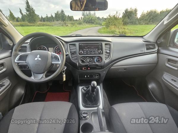 Red Mitsubishi l-200 2017 in Tallinn, with an engine capacity of 2.40 L and mileage of 168 thousand km for 18000 €, photo 10 on AUTOMOTO.COM.LV
