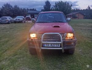 Sarkans Mitsubishi l-200 1997 Jonava, ar dzinēja tilpumu 2.48 L un nobraukumu 240 tūkst. km par 2750 €, foto 3 vietnē AUTOMOTO.COM.LV