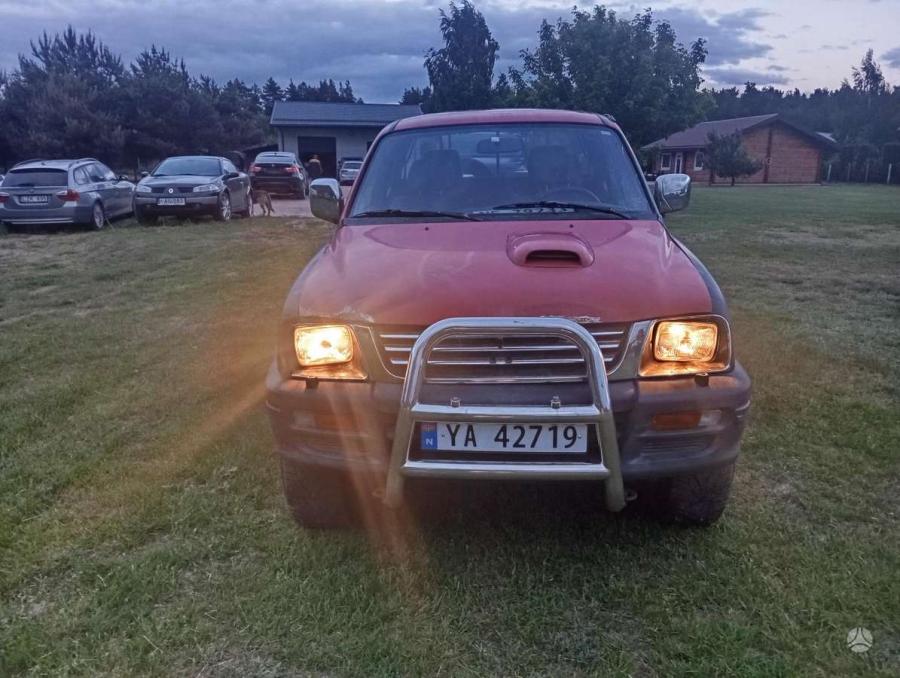 Sarkans Mitsubishi l-200 1997 Jonava, ar dzinēja tilpumu 2.48 L un nobraukumu 240 tūkst. km par 2750 €, foto 3 vietnē AUTOMOTO.COM.LV