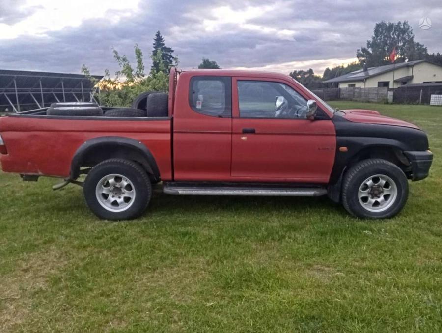 Sarkans Mitsubishi l-200 1997 Jonava, ar dzinēja tilpumu 2.48 L un nobraukumu 240 tūkst. km par 2750 €, foto 7 vietnē AUTOMOTO.COM.LV