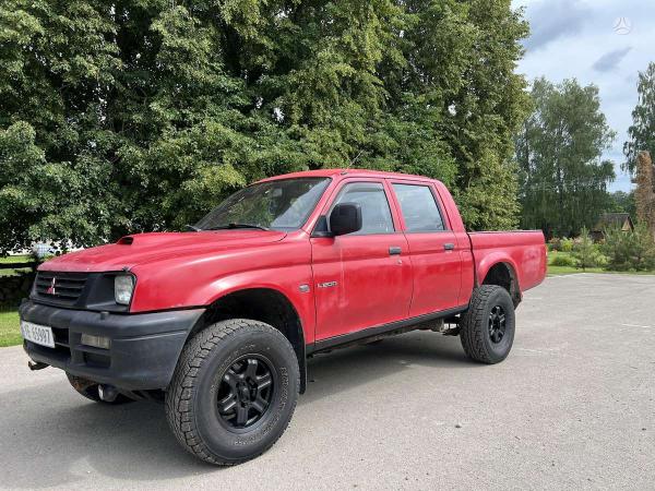 Sarkans Mitsubishi l-200 1998 Pasvalys, ar dzinēja tilpumu 2.50 L un nobraukumu 300 tūkst. km par 3650 €, foto 2 vietnē AUTOMOTO.COM.LV
