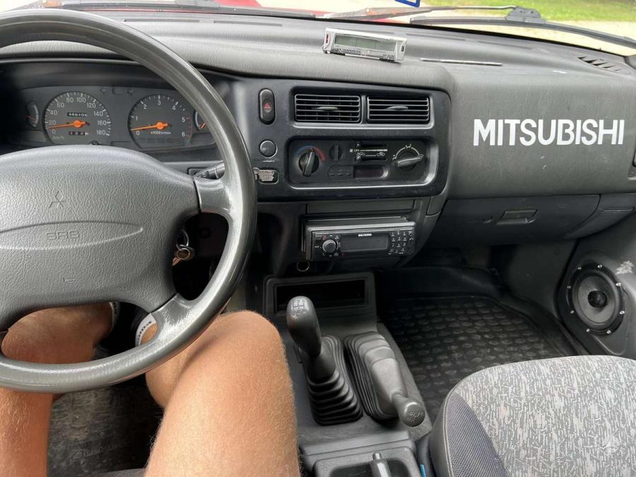 Red Mitsubishi l-200 1998 in Pasvalys, with an engine capacity of 2.50 L and mileage of 300 thousand km for 3650 €, photo 8 on AUTOMOTO.COM.LV