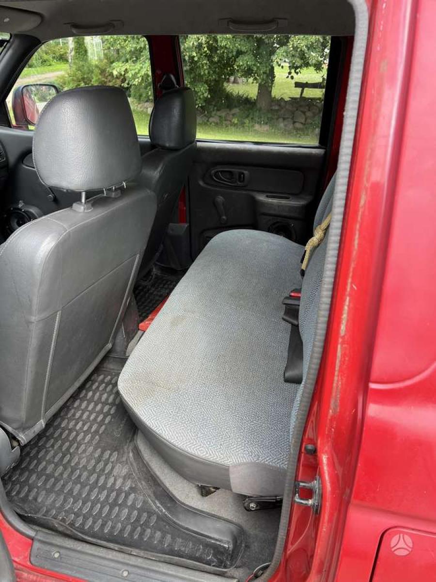 Red Mitsubishi l-200 1998 in Pasvalys, with an engine capacity of 2.50 L and mileage of 300 thousand km for 3650 €, photo 9 on AUTOMOTO.COM.LV