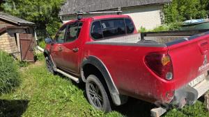 Red Mitsubishi l-200 2009 in Aizkraukle, with an engine capacity of 2.50 L and mileage of 460 thousand km for 6500 €, photo 5 on AUTOMOTO.COM.LV