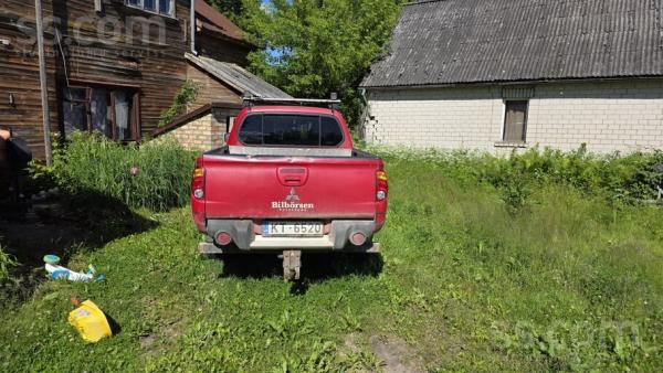 Red Mitsubishi l-200 2009 in Aizkraukle, with an engine capacity of 2.50 L and mileage of 460 thousand km for 6500 €, photo 7 on AUTOMOTO.COM.LV