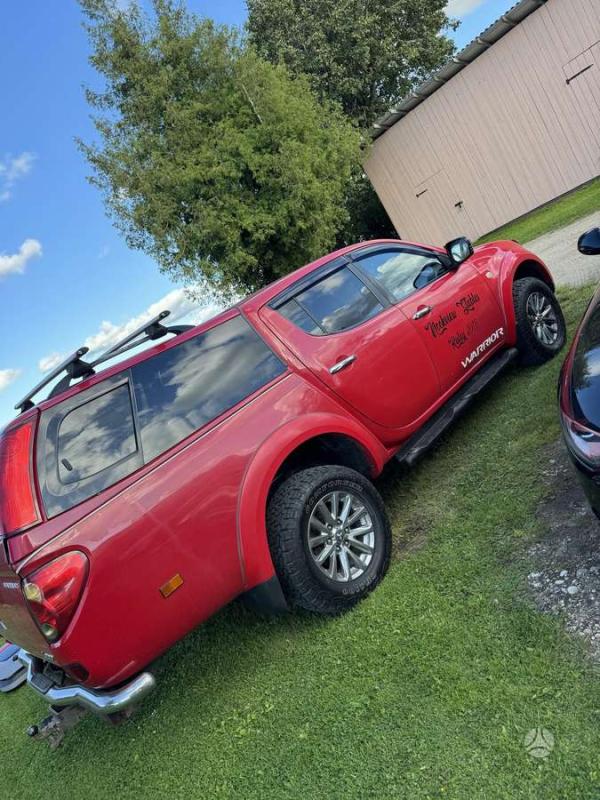 Red Mitsubishi l-200 2010 in Silute, with an engine capacity of 2.48 L and mileage of 196 thousand km for 6000 €, photo 3 on AUTOMOTO.COM.LV