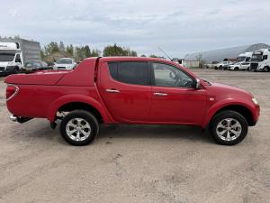 Red Mitsubishi l-200 2012 in Silute, with an engine capacity of 2.48 L and mileage of 107 thousand km for 5750 €, photo 3 on AUTOMOTO.COM.LV