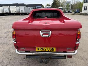 Red Mitsubishi l-200 2012 in Silute, with an engine capacity of 2.48 L and mileage of 107 thousand km for 5750 €, photo 5 on AUTOMOTO.COM.LV