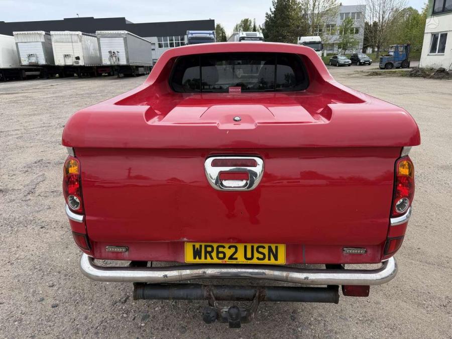 Red Mitsubishi l-200 2012 in Silute, with an engine capacity of 2.48 L and mileage of 107 thousand km for 5750 €, photo 5 on AUTOMOTO.COM.LV