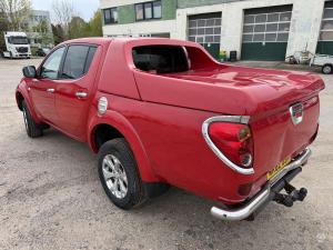 Red Mitsubishi l-200 2012 in Silute, with an engine capacity of 2.48 L and mileage of 107 thousand km for 5750 €, photo 6 on AUTOMOTO.COM.LV