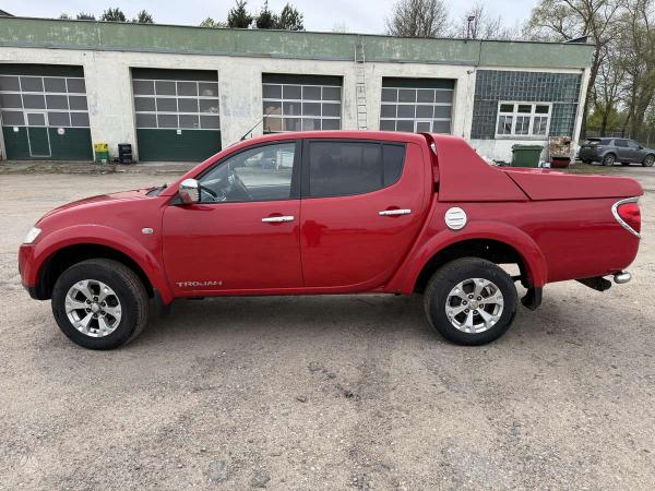 Red Mitsubishi l-200 2012 in Silute, with an engine capacity of 2.48 L and mileage of 107 thousand km for 5750 €, photo 6 on AUTOMOTO.COM.LV
